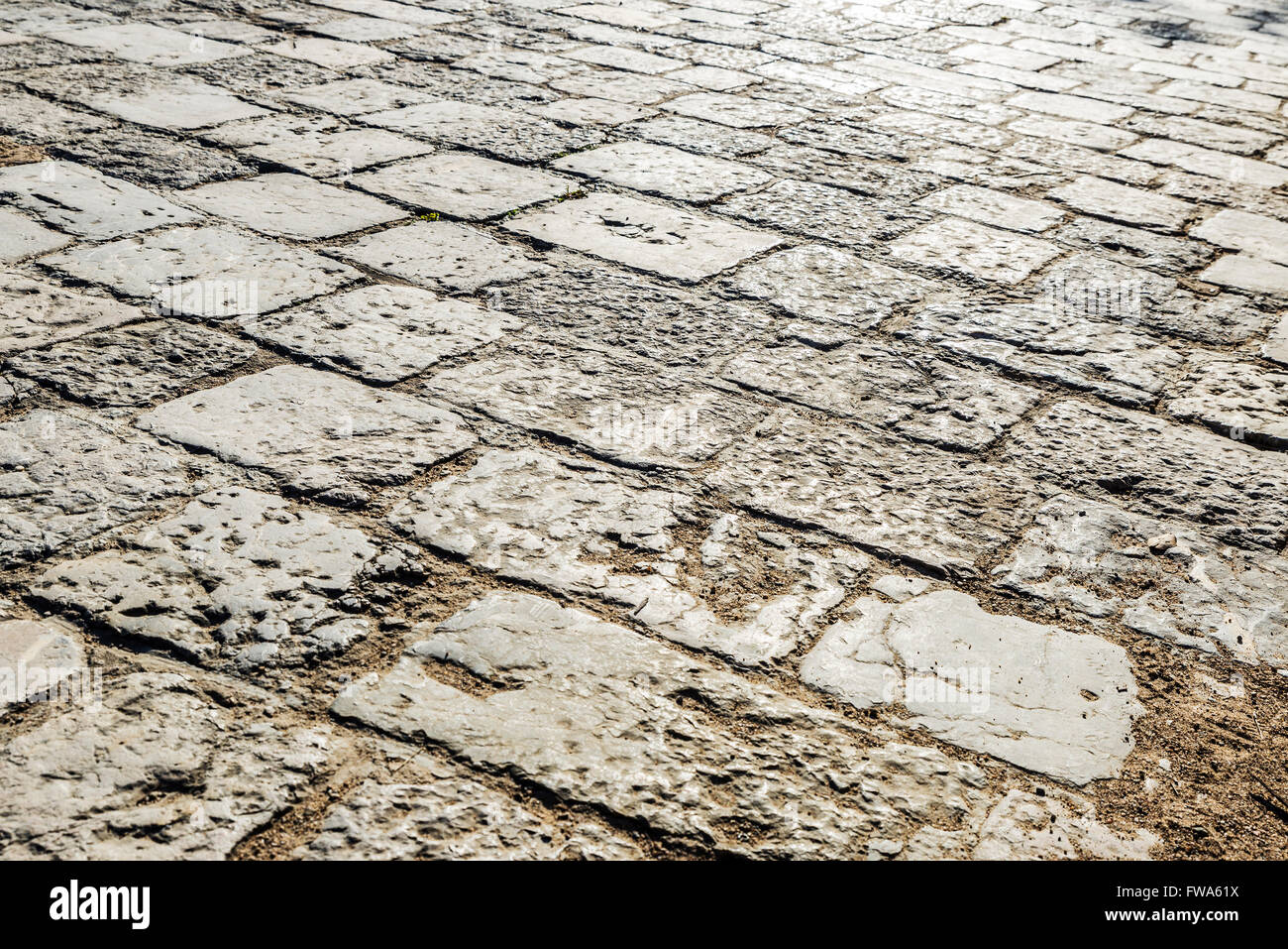 Stone paved road Banque de photographies et d’images à haute résolution ...