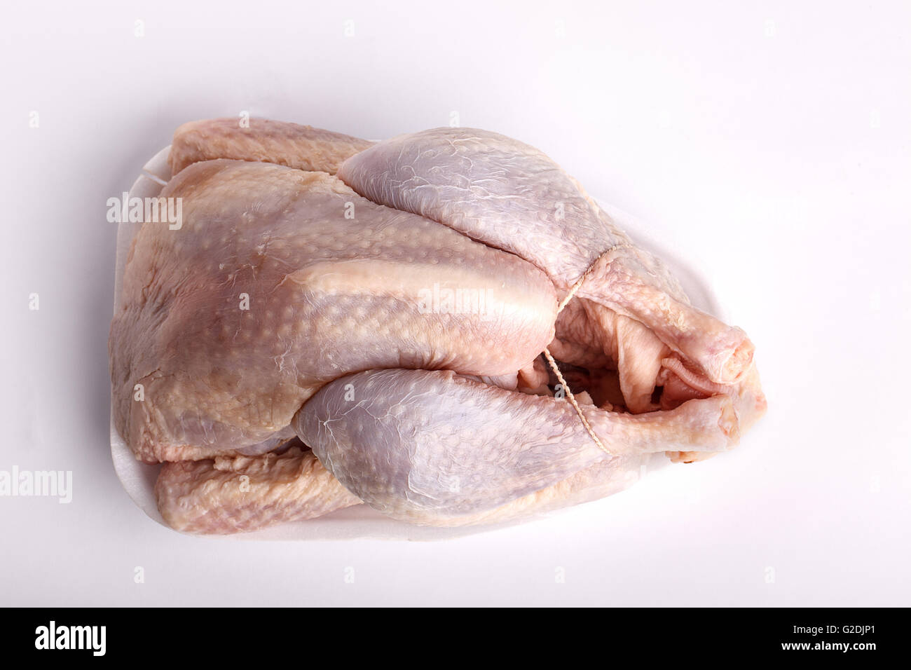 Matières ensemble poulet déplumé prête pour la cuisson sur une matière ...