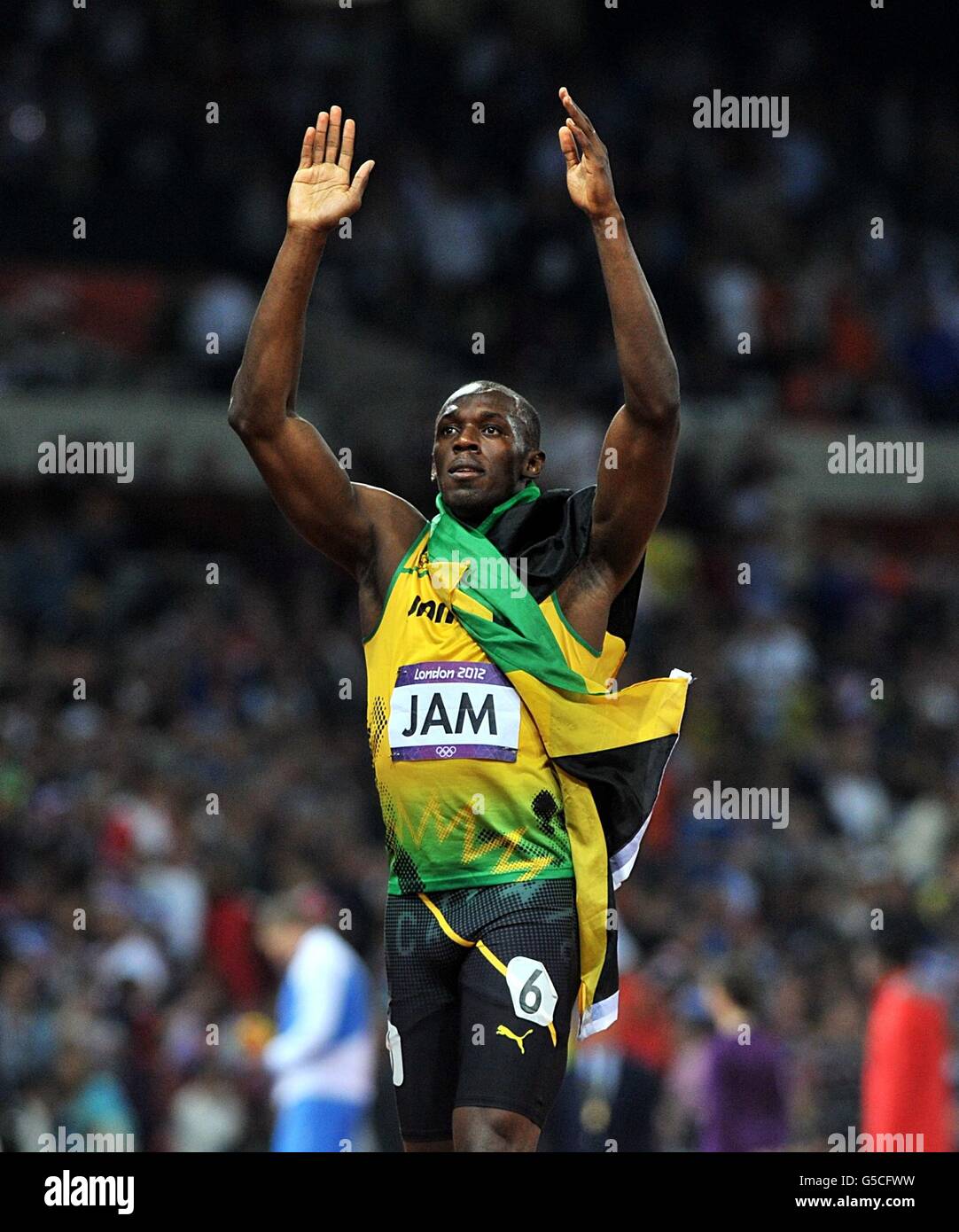 Usain Bolt de la Jamaïque célèbre après que son équipe a remporté la ...