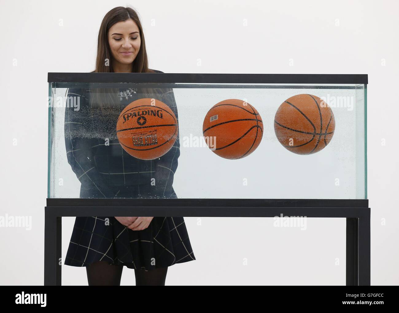 Three ball total equilibrium tank Banque de photographies et d’images à ...