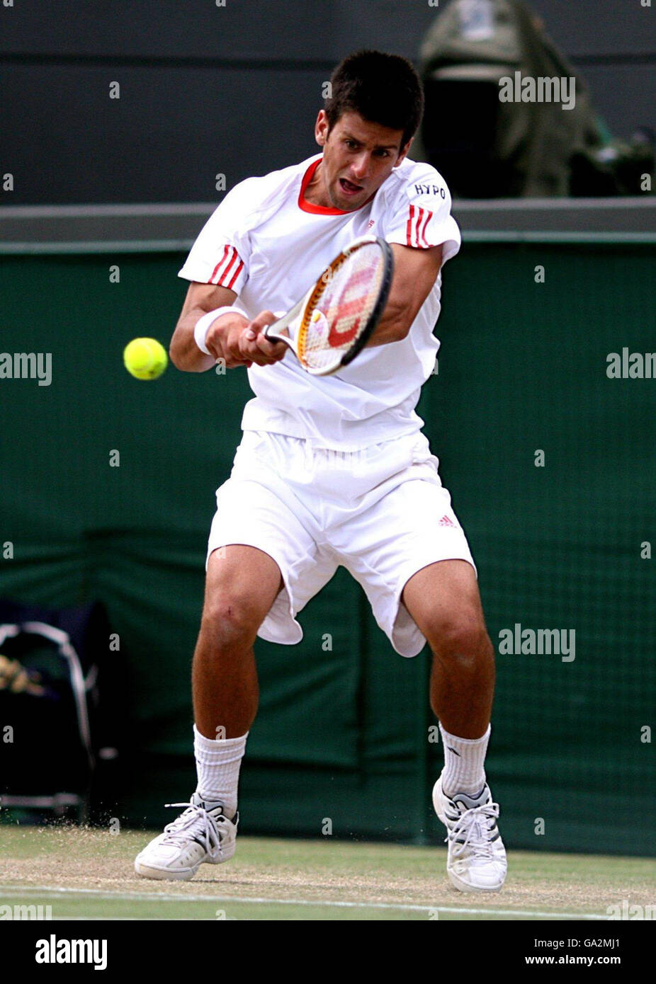 Novak djokovic en action contre marcos baghdatis Banque de ...