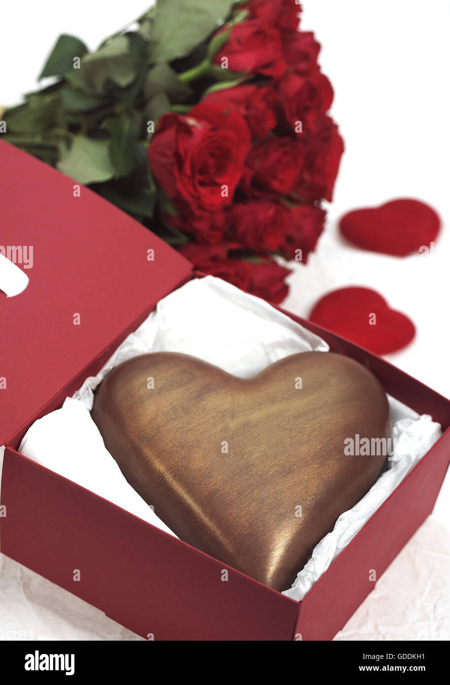 Terre au chocolat avec une rose rouge pour la saint valentin Banque de ...