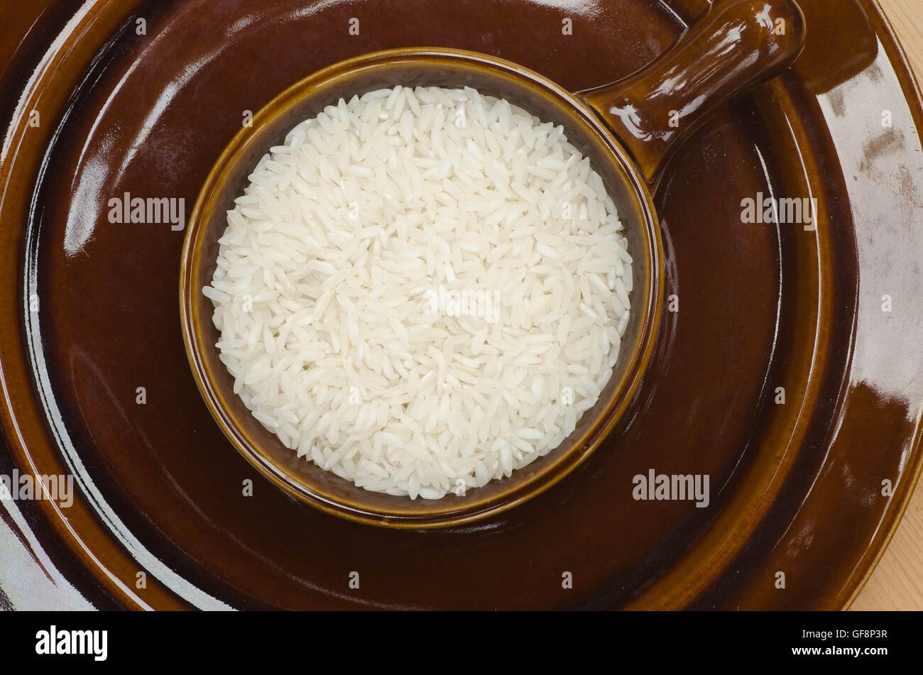 Manger du riz cru Banque de photographies et d’images à haute ...