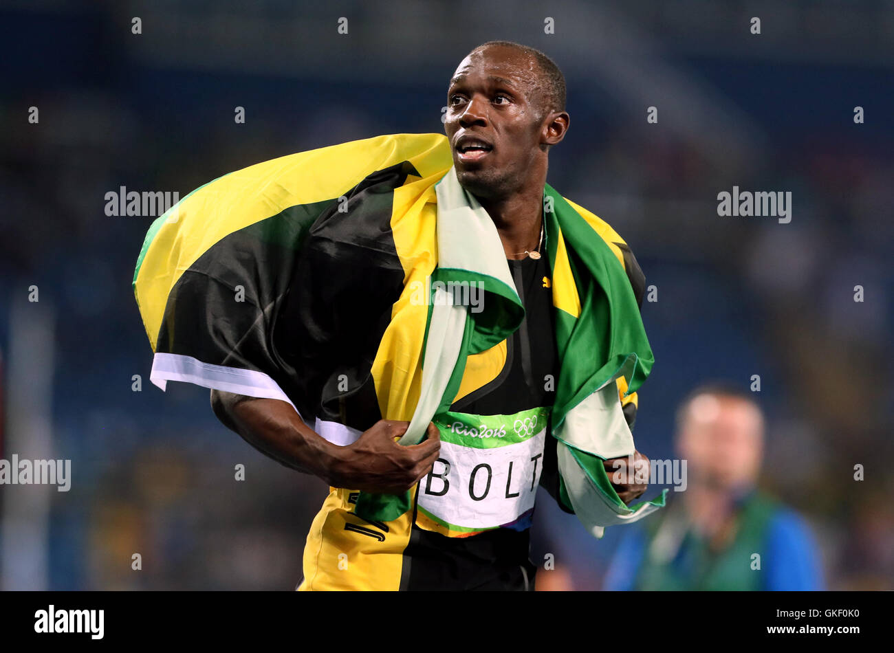 Usain Bolt de la Jamaïque célèbre après son ancrage Men's 4 x 100m de l ...