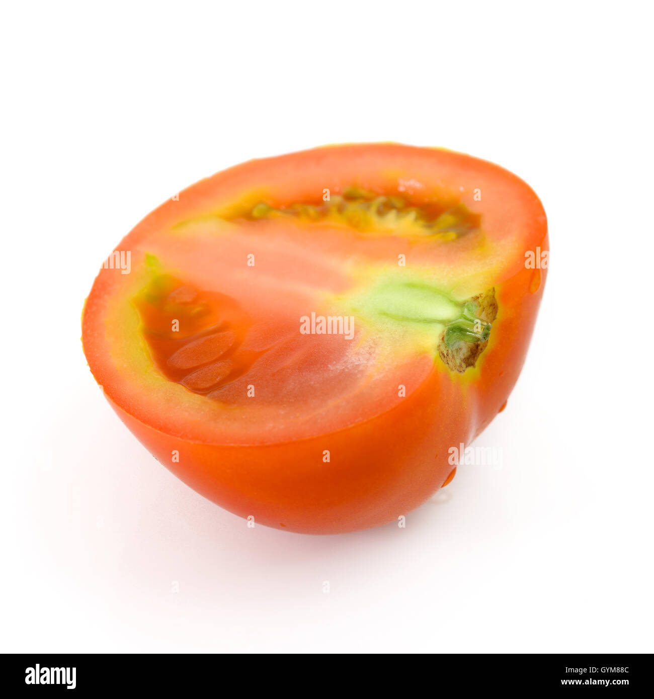 Coupe transversale de tomate Banque d'images détourées - Alamy
