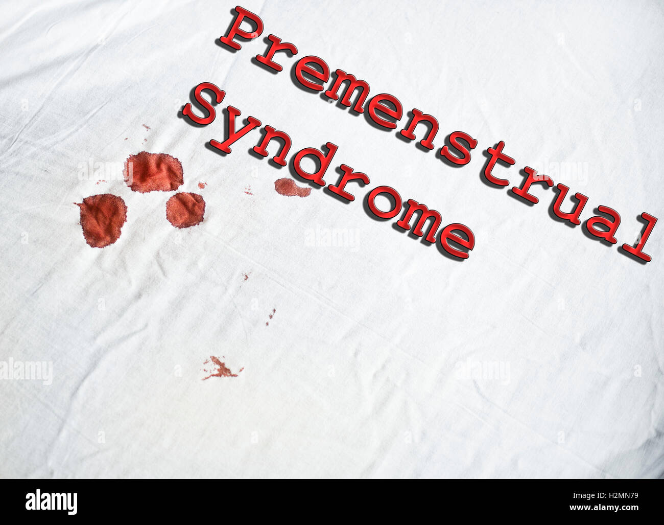 Syndrome prémenstruel signe sur feuille blanche avec du sang Photo ...