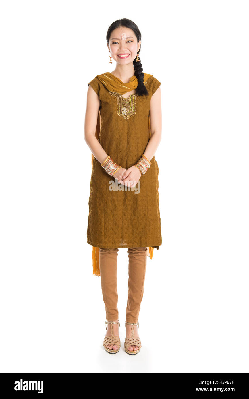 Portrait of young mixed race Indian Chinese woman in traditional ...