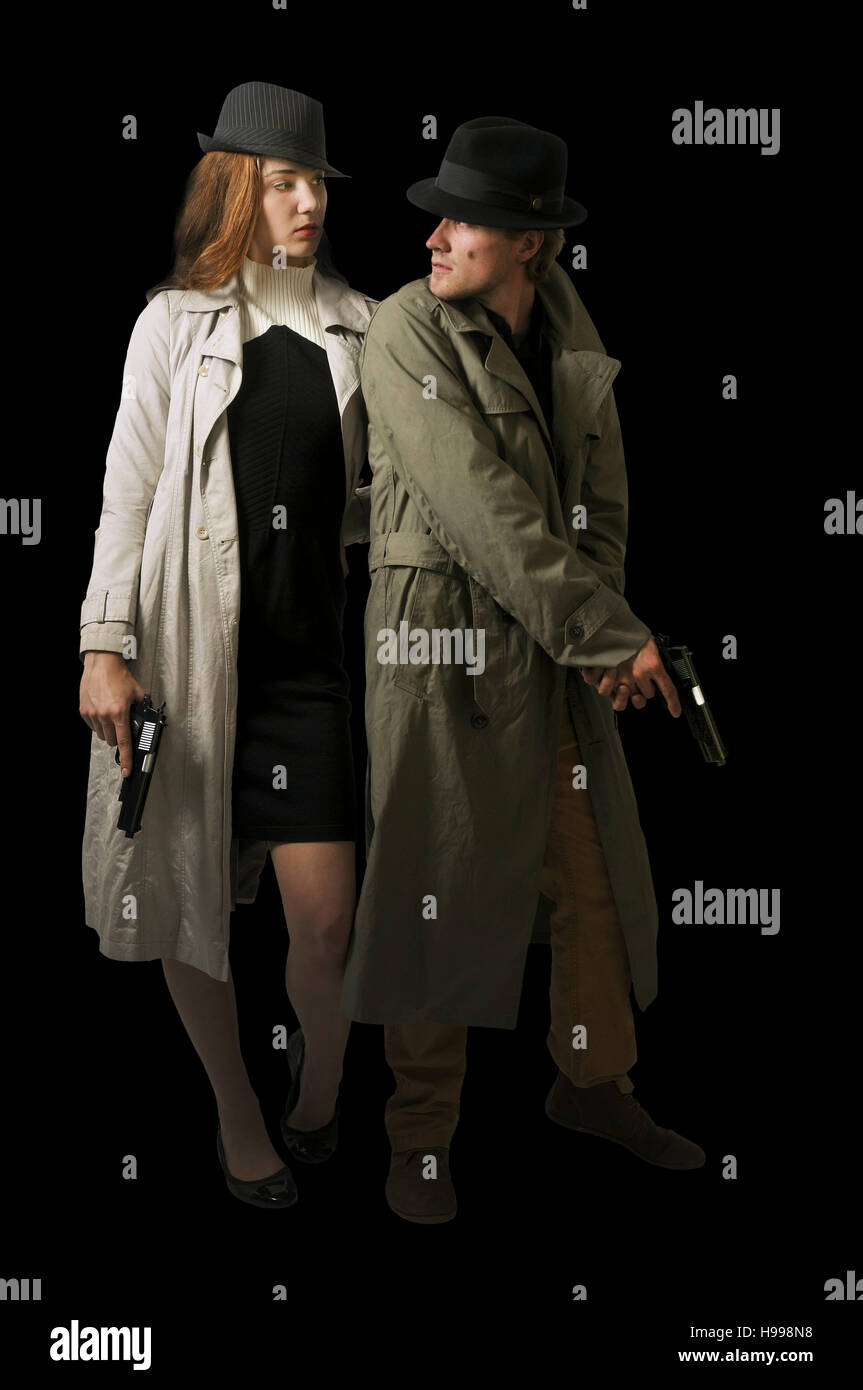 L'homme et la femme de l'agent secret spies avec armes à feu Photo ...