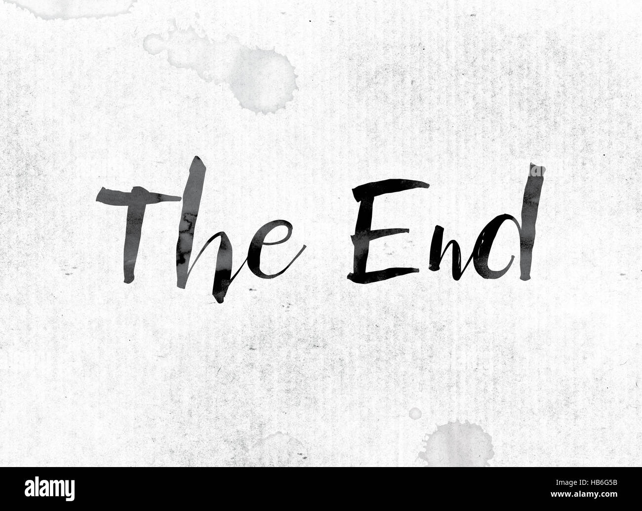 Le mot 'Fin' concept et thème sur aquarelle ou d'encre sur un papier ...