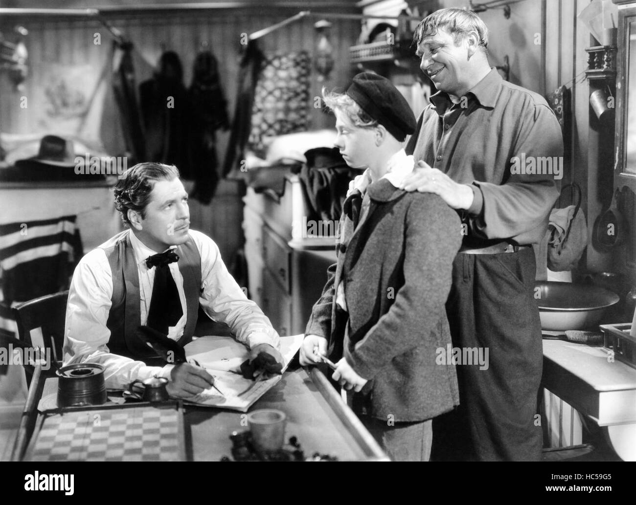 Navire d'esclaves, de gauche : Warner Baxter, Mickey Rooney, Wallace ...