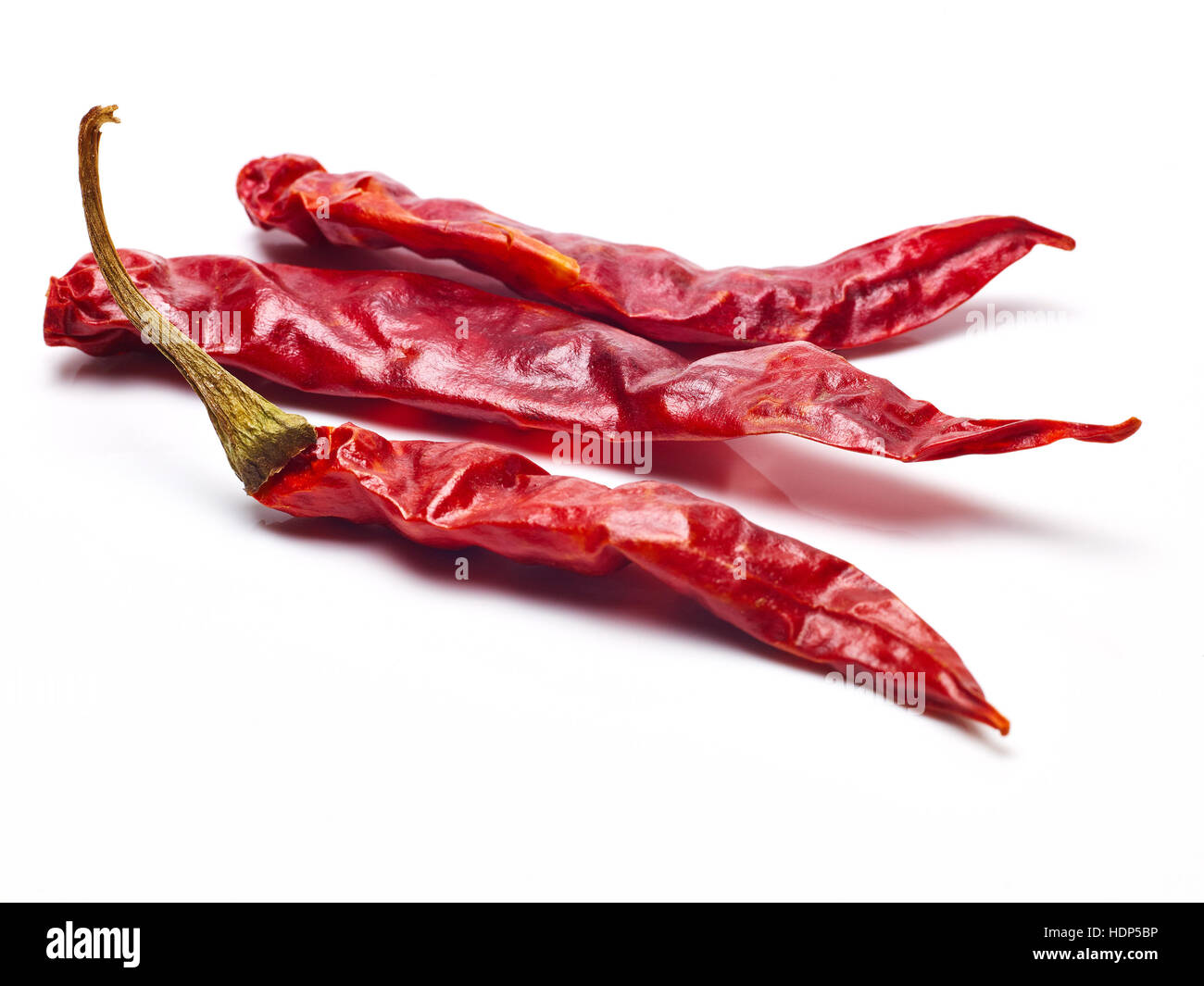 Piments rouges sur blanc Banque de photographies et d’images à haute ...