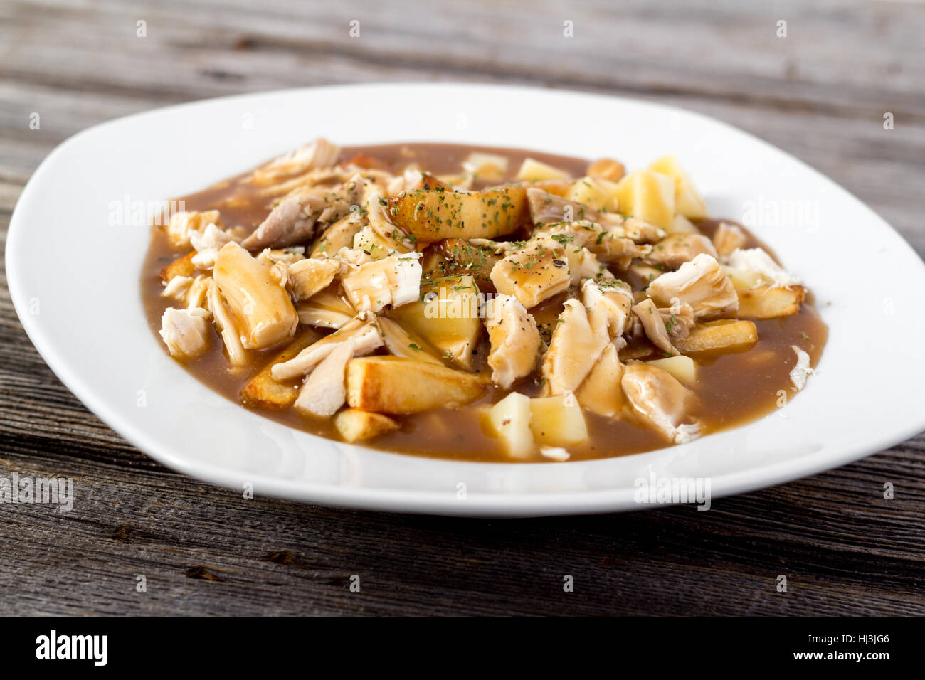 Poulet frit et frites au fromage Banque de photographies et d’images à ...