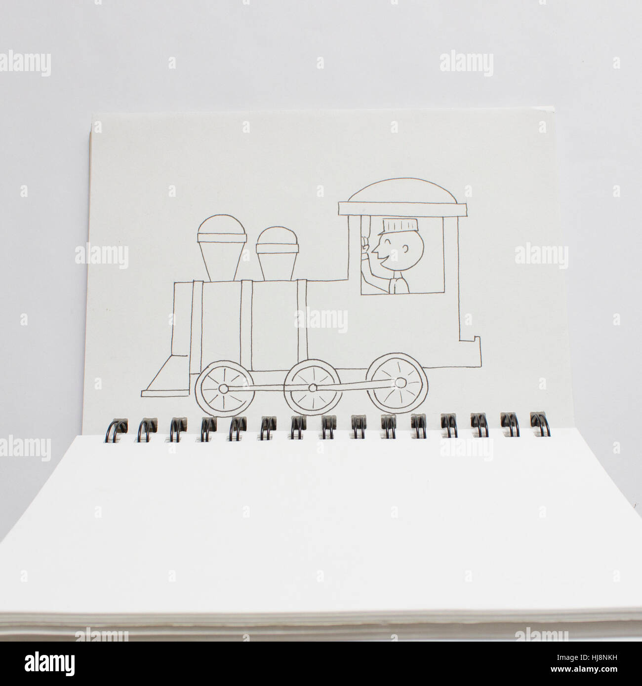 Dessiner dans son cahier Banque de photographies et d’images à haute ...