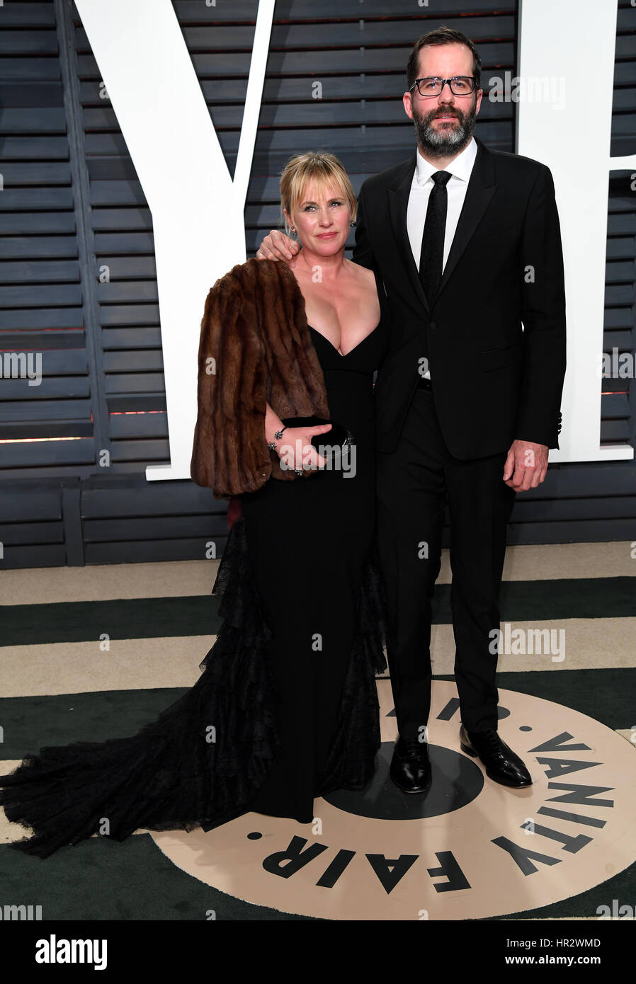 Patricia Arquette et Eric White arrivant à la Vanity Fair Oscar Party à ...