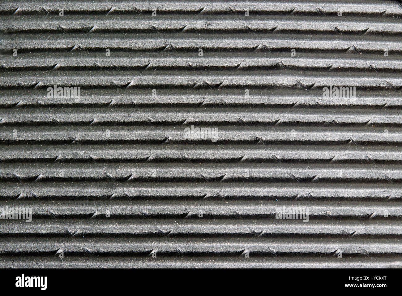 La texture de caoutchouc avec une bande linéaire en saillie, et s ...