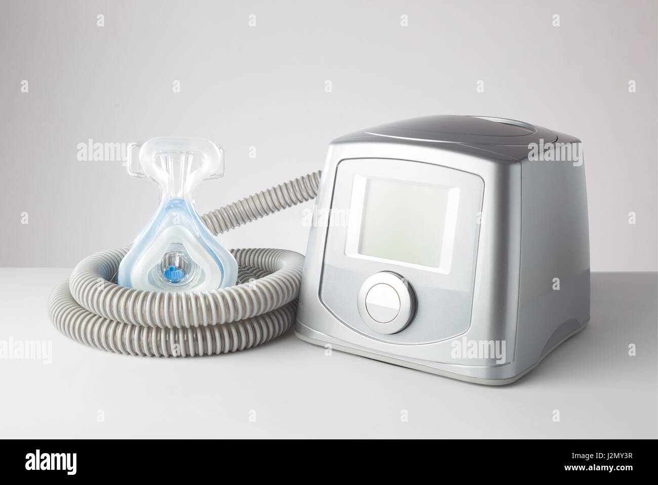 L'apnée du sommeil appareil CPAP avec tête flexible et entendre, masque ...