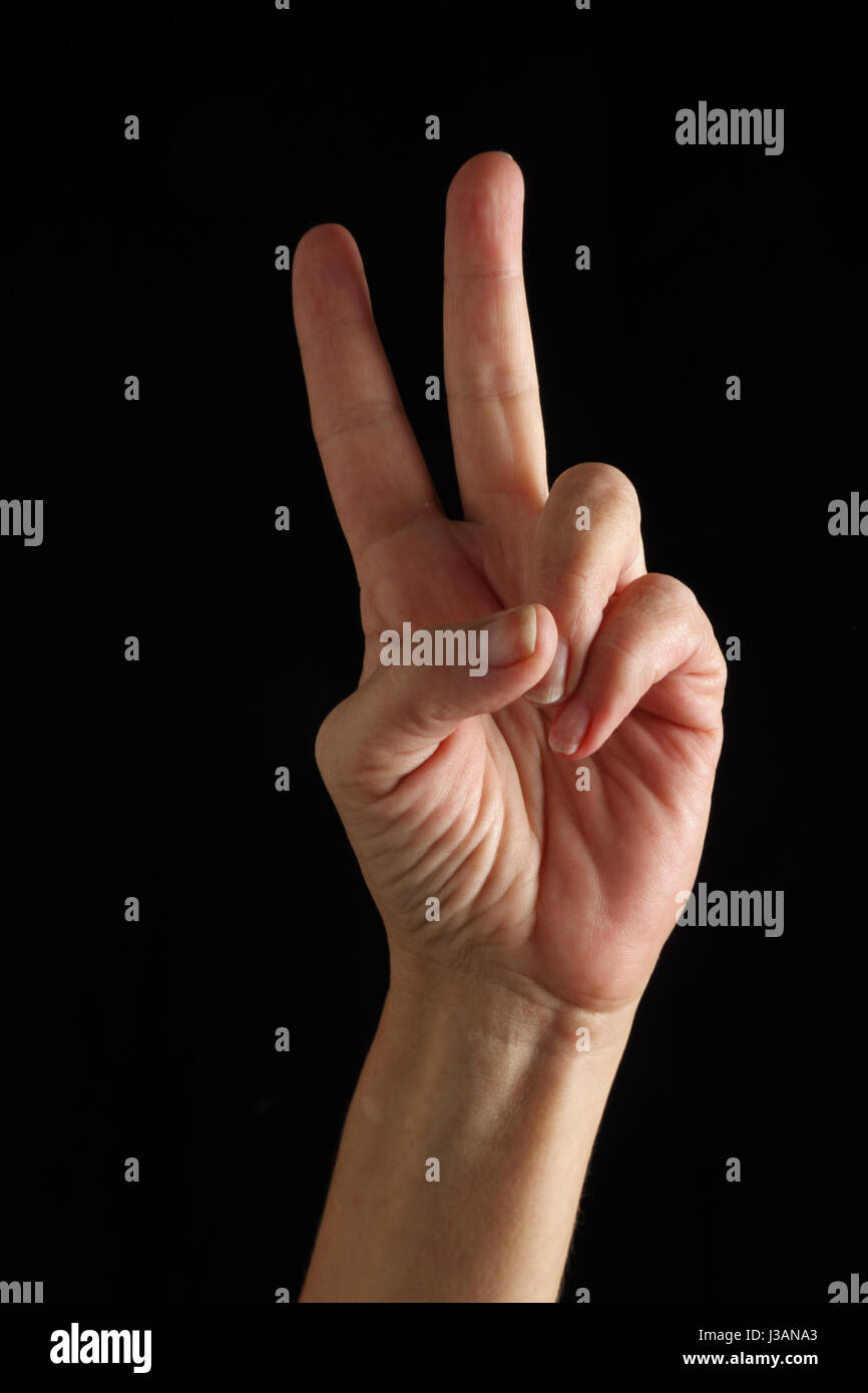 V signe main Banque de photographies et d’images à haute résolution - Alamy
