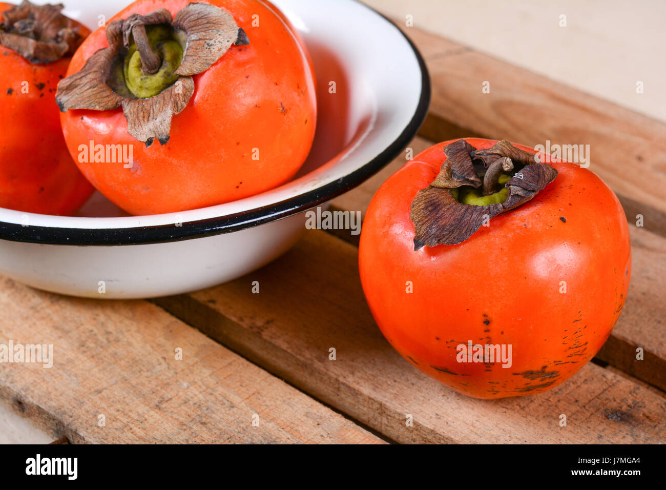 Kaki fruits Banque de photographies et d’images à haute résolution - Alamy