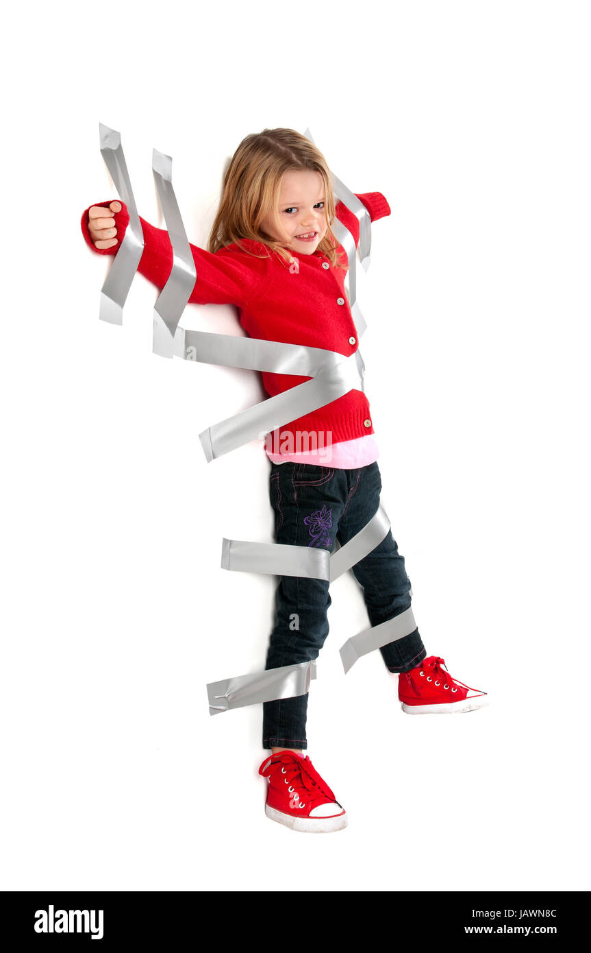 Young girl tied to wall with duct tape Banque de photographies et d ...