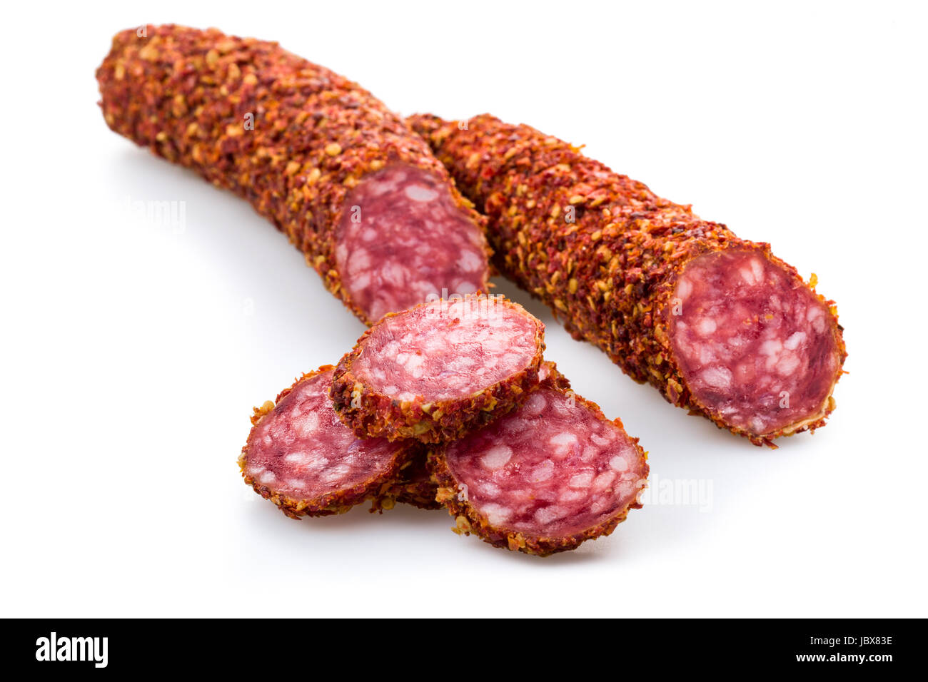 Saucisson Fuet aufgeschnitten isoliert auf weissen hintergrund Photo ...