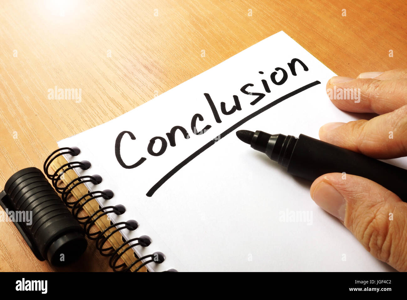 L'écriture est la conclusion d'une note Photo Stock - Alamy