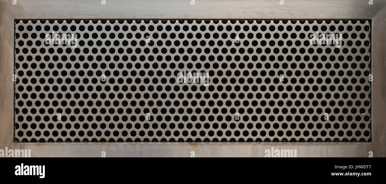 Perforated metal plate Banque de photographies et d’images à haute ...