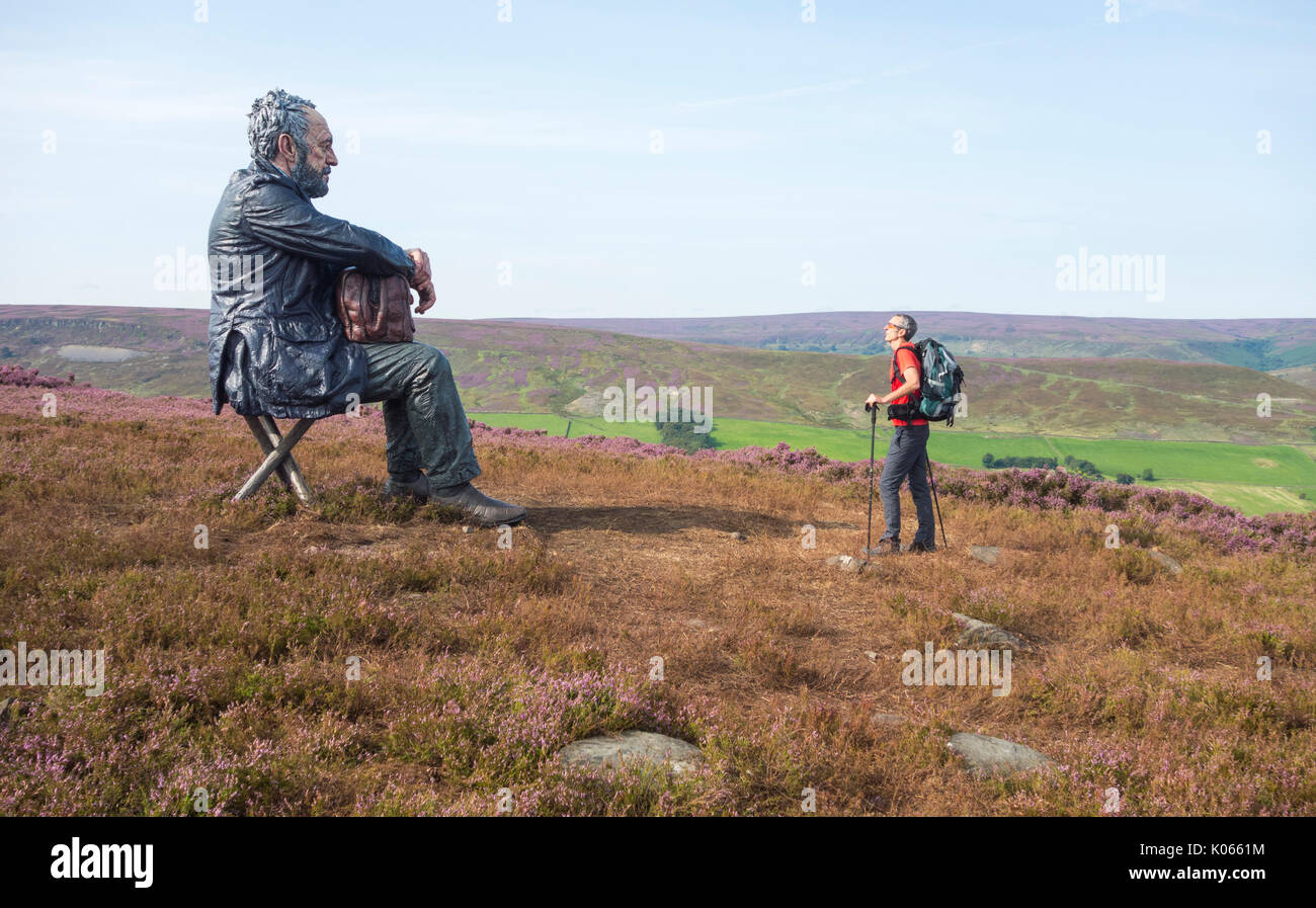 Sculpture homme assis Banque de photographies et d’images à haute ...