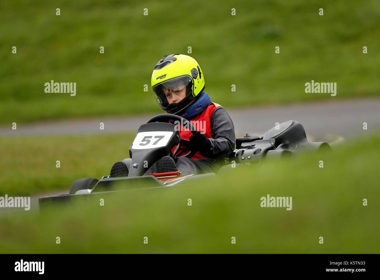 Junior go kart racing Banque de photographies et d’images à haute ...