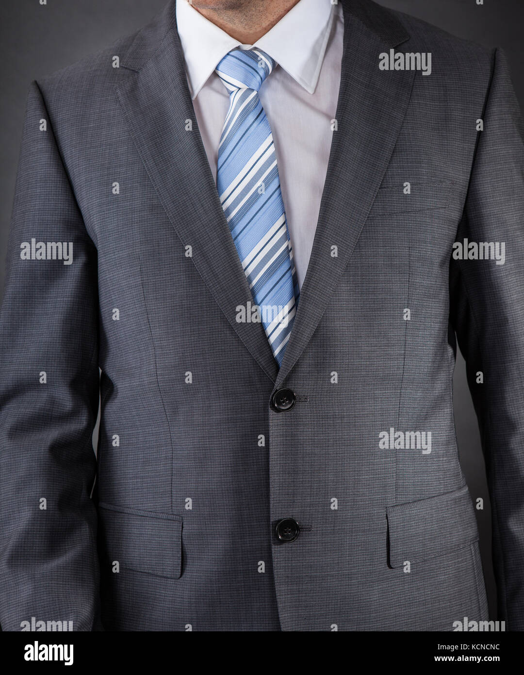 Homme habillé en costume Banque de photographies et d’images à haute ...