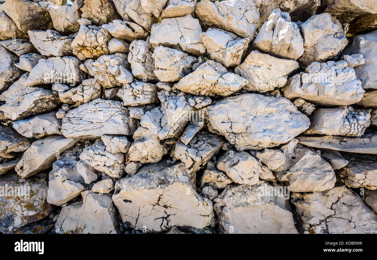 Rock pierre clôture ou mur de gabions de texture. ancien construit un ...