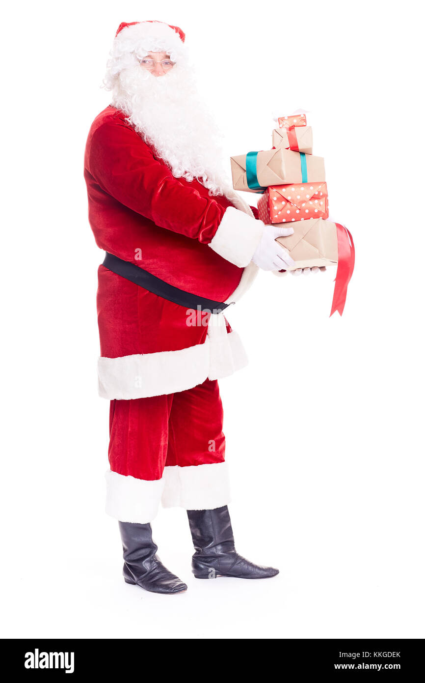 Père noël donnant des cadeaux Banque d'images détourées - Alamy