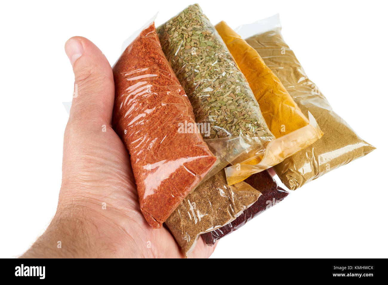 Variété d'épices turc en emballage transparent dans la main sur fond ...