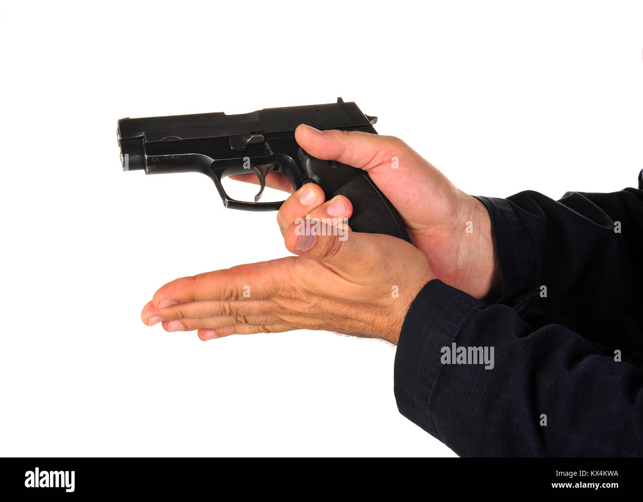 Dans la main des armes de poing Banque de photographies et d’images à ...