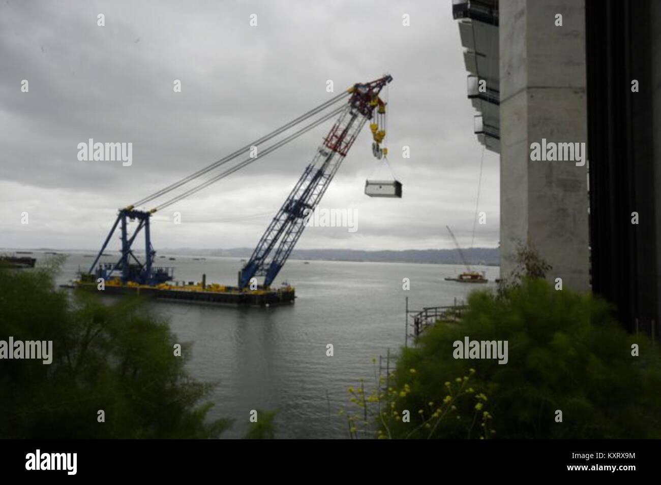 Photographie ou schéma d'un pont élévateur à traverse, un dispositif de ...