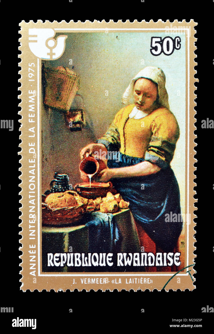 Timbre-poste imprimé par le Rwanda, qui montre une peinture de Vermeer ...
