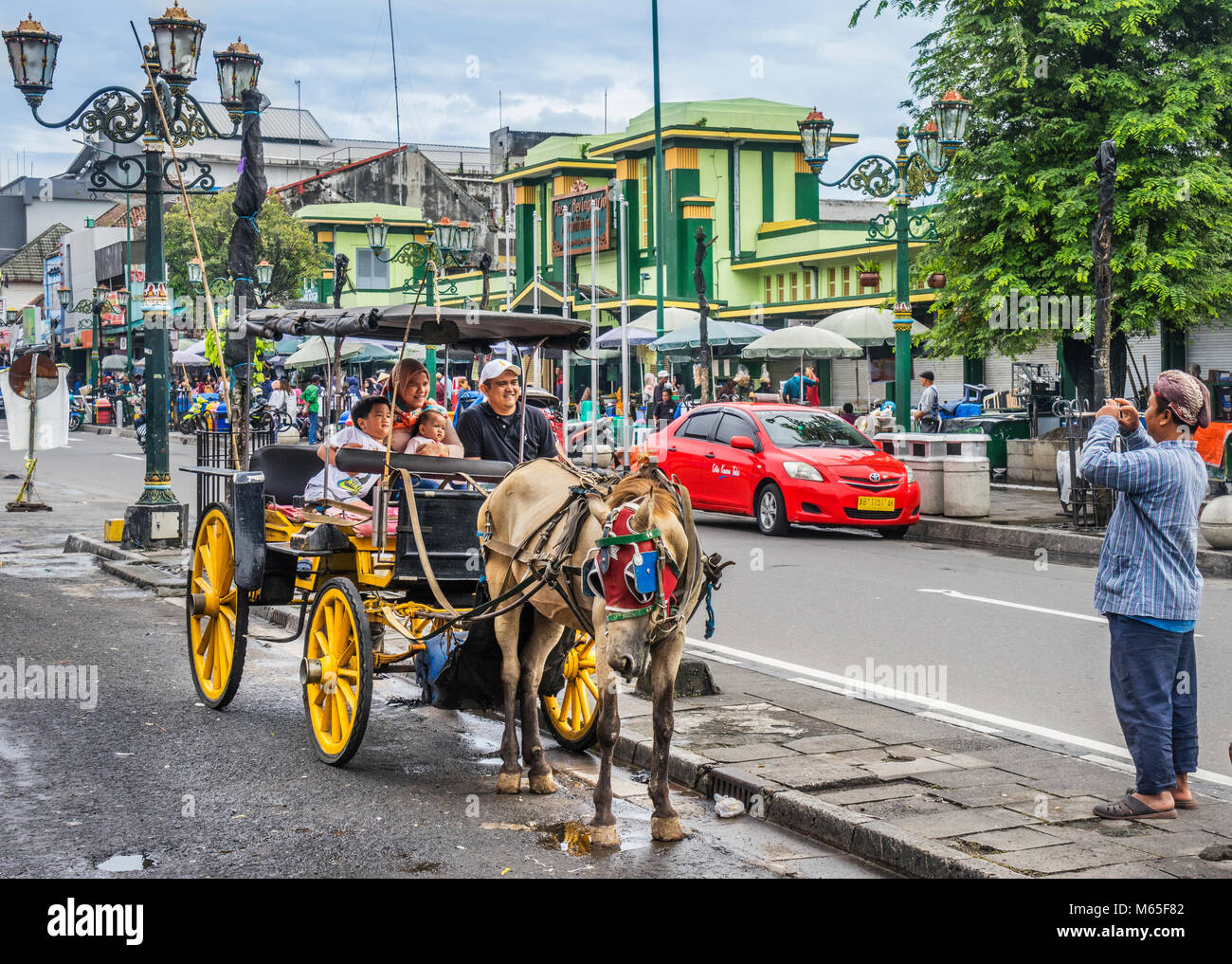 En Indonésie, le centre de Java, Yogyakarta, tiré par des chevaux ...