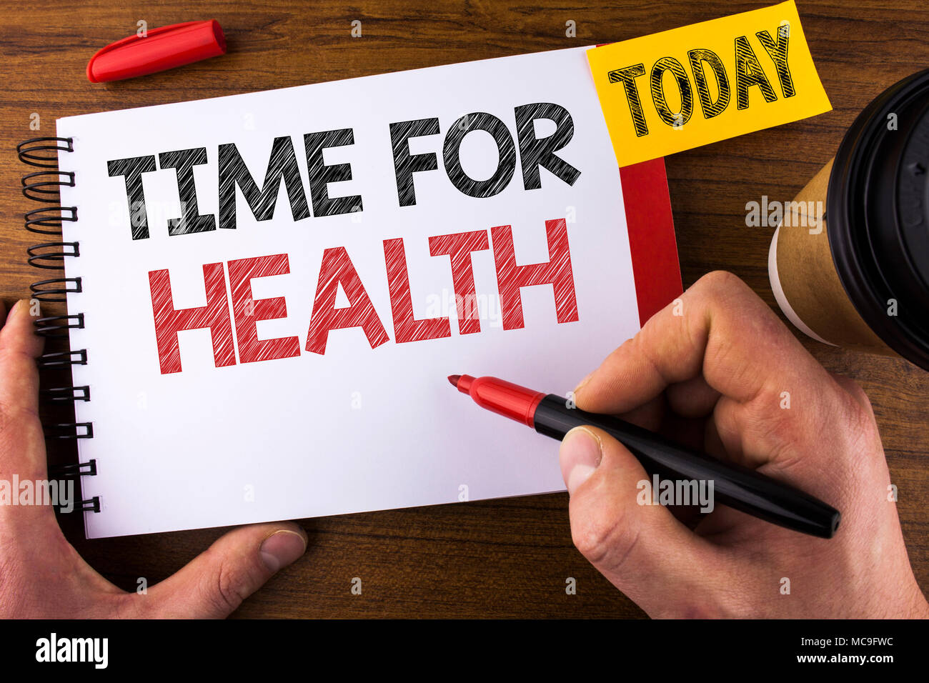 Main conceptuel écrit, indiquant le temps de la santé. Le changement de ...