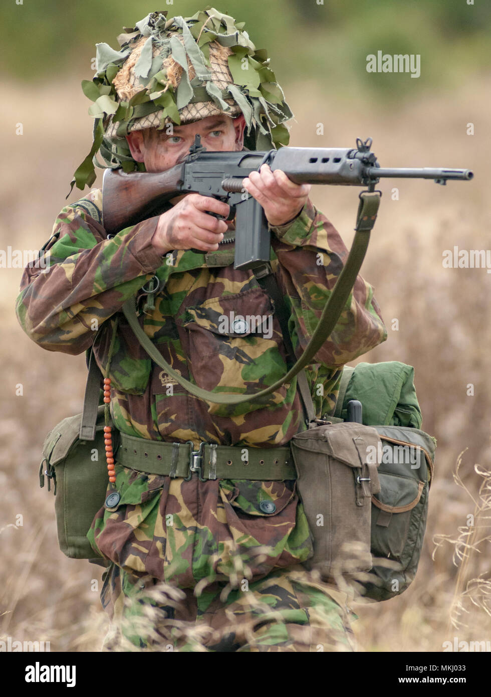 1970 - 1980 soldat de l'Armée britannique en camouflage et portant un ...