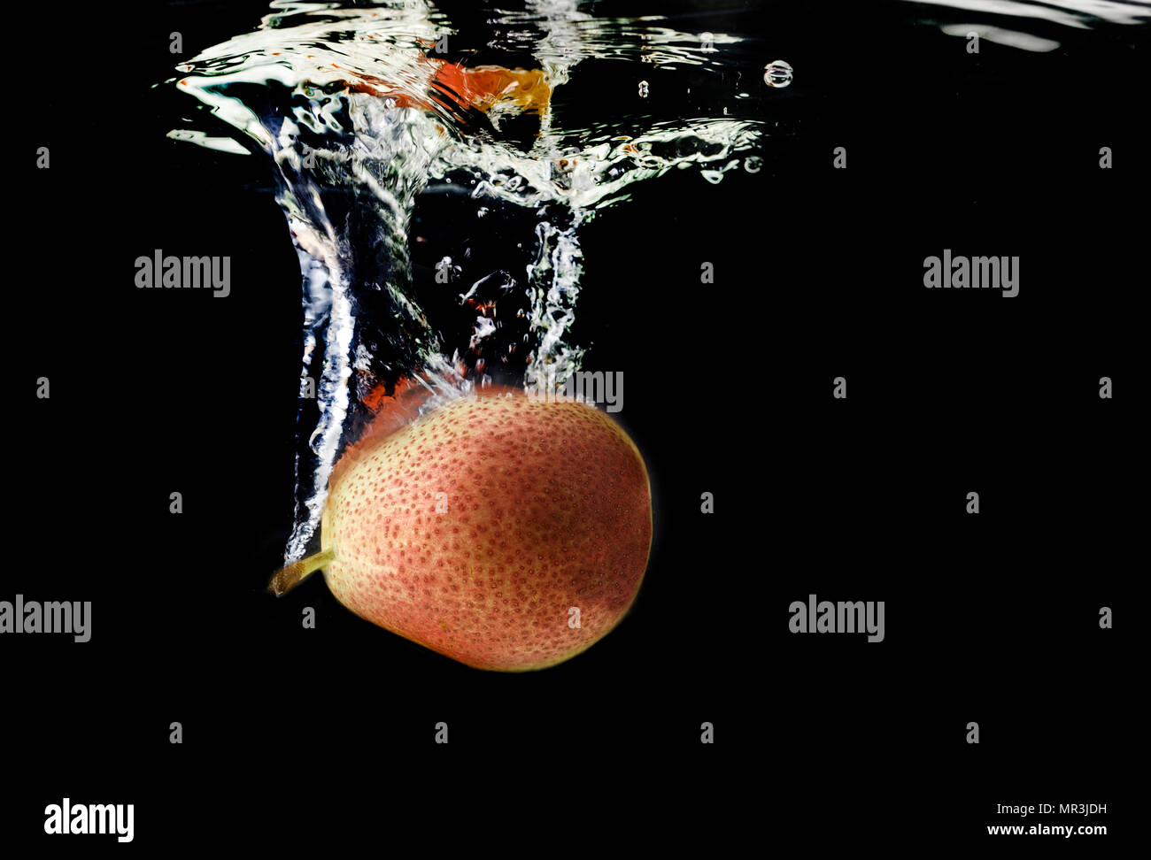 Fruit juice splash poire Banque de photographies et d’images à haute ...