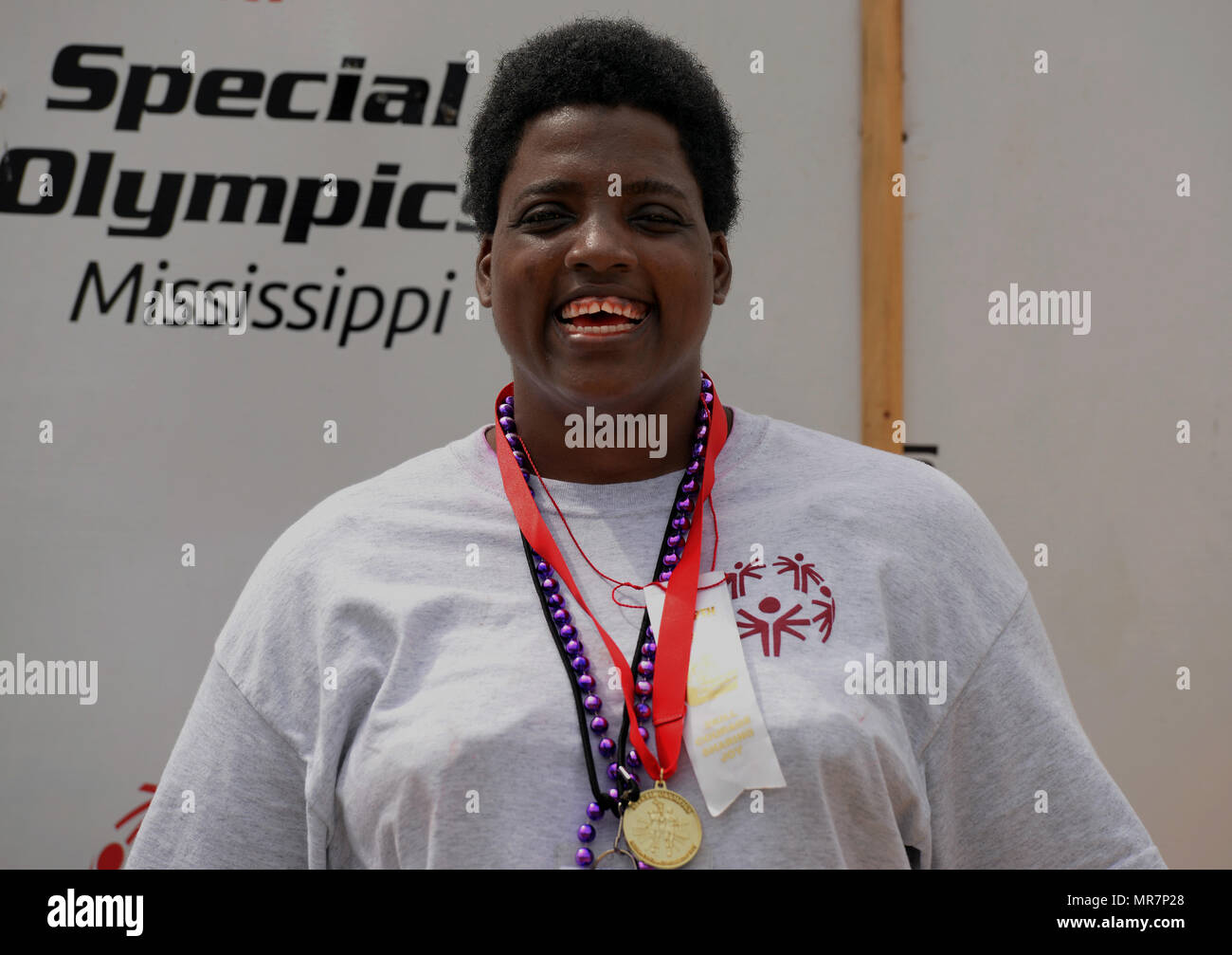 Michelle Merrick, salon 12 athlètes, pose pour une photo après avoir ...