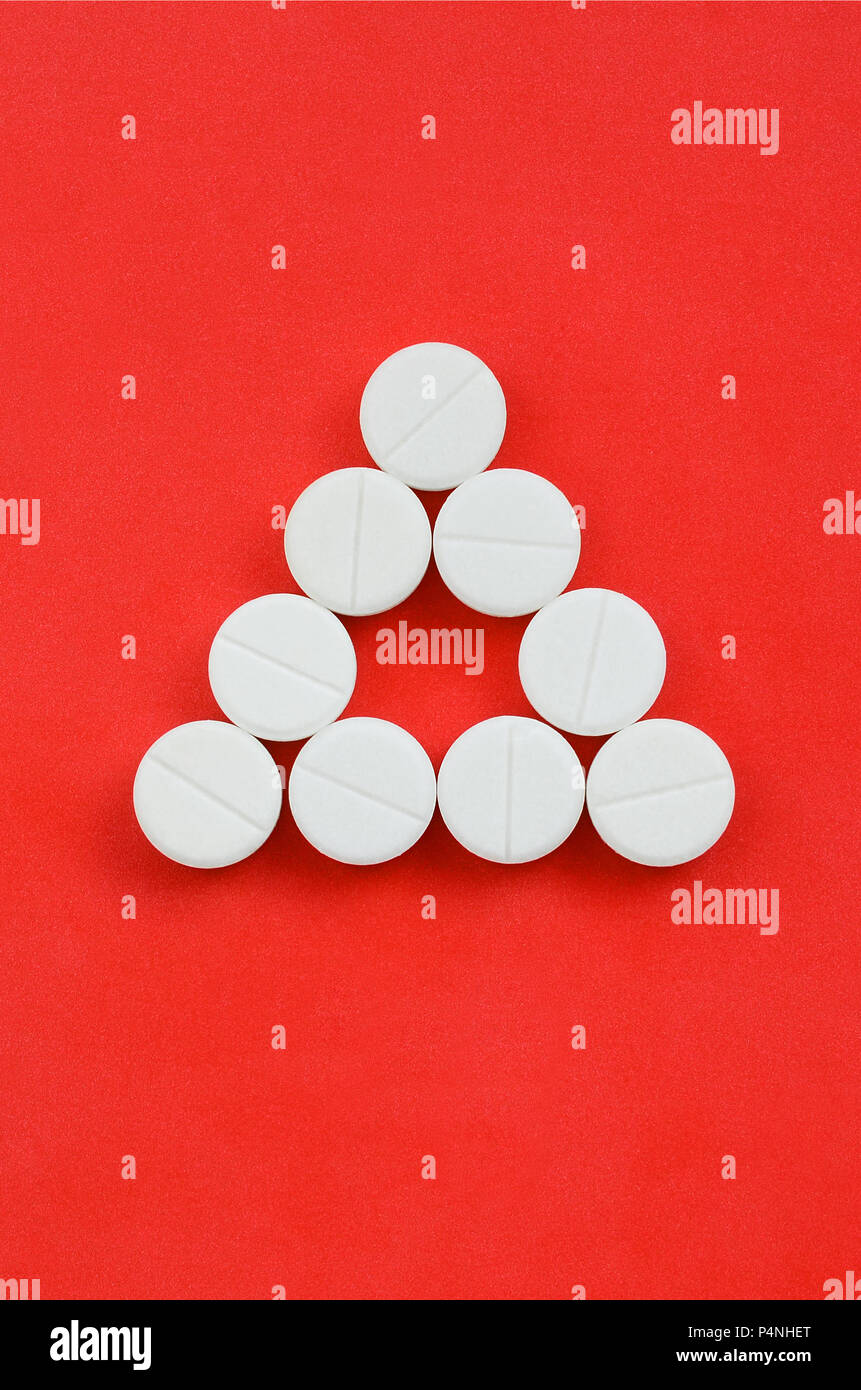 Pilule rose et blanche triangulaire Banque de photographies et d’images ...