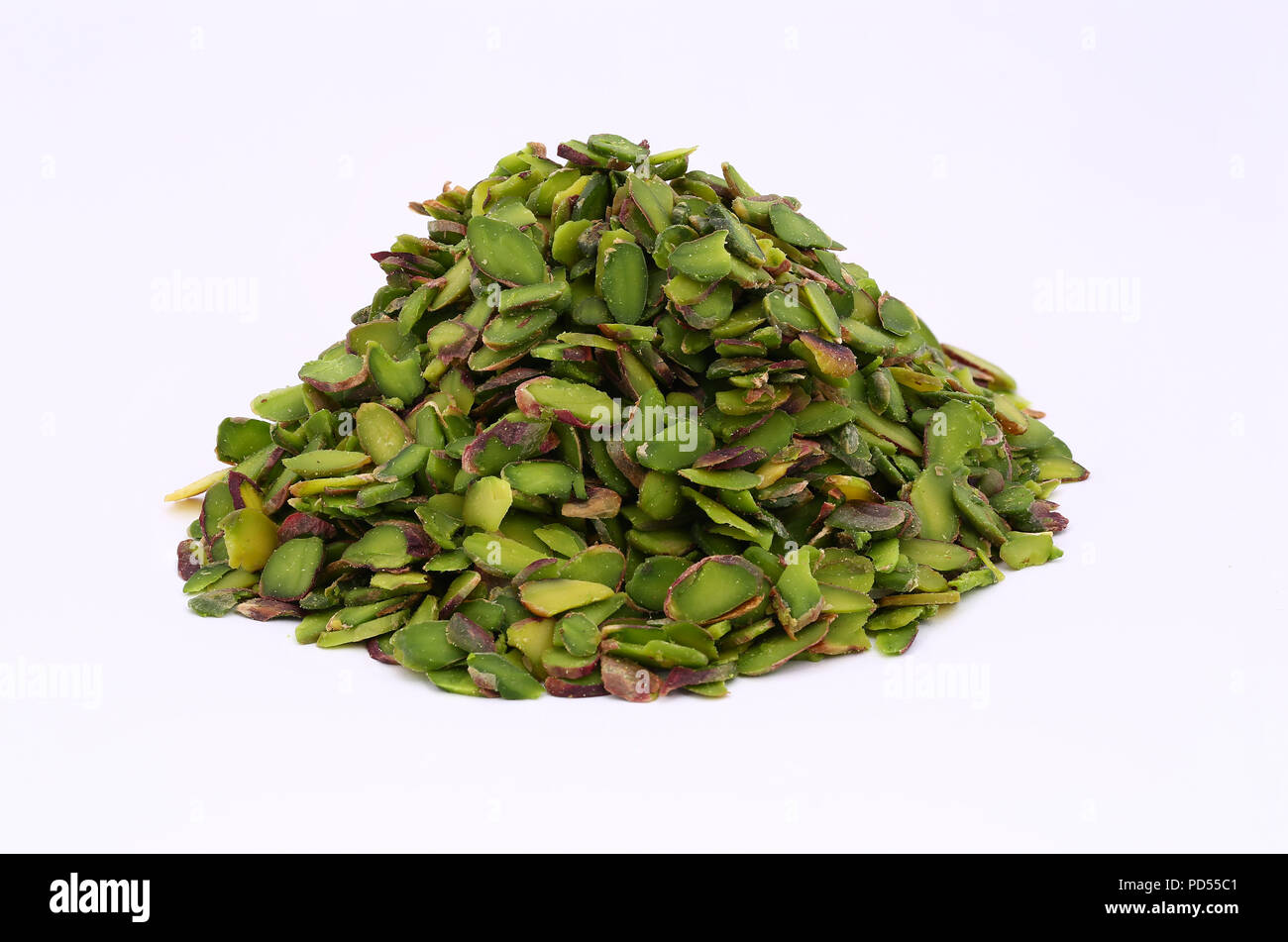 Pistaches grillées de l'Unshelled heap et poudre de pistache Photo ...