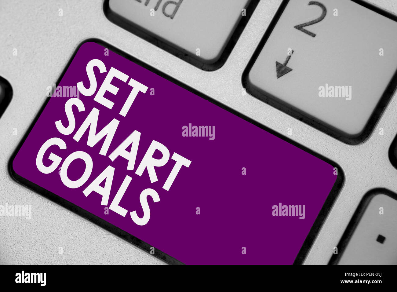 Main conceptuel écrit, indiquant les objectifs Smart Set. Photo d ...