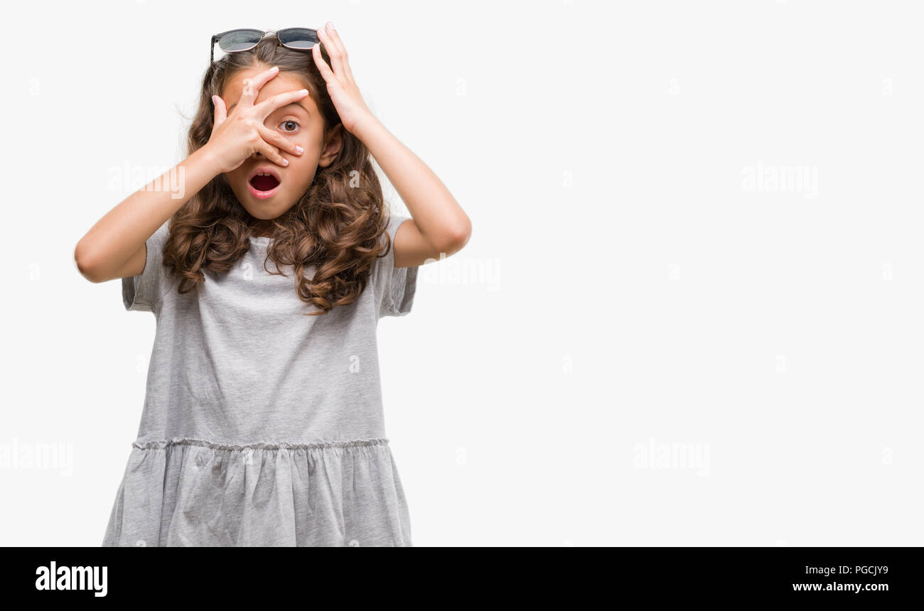 Cute shy girl looking embarrassed Banque d'images détourées - Alamy