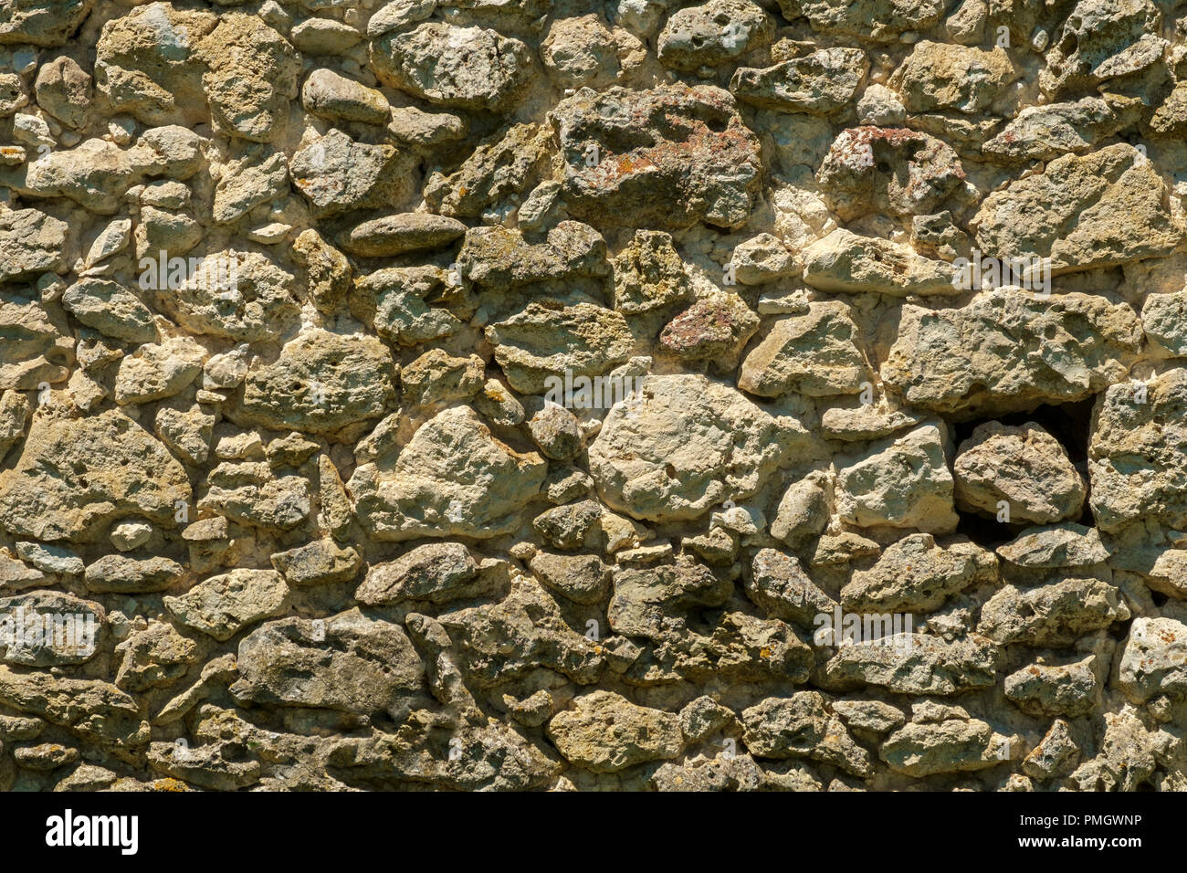 Texture background plein cadre d'une construction de mur en moellons ...