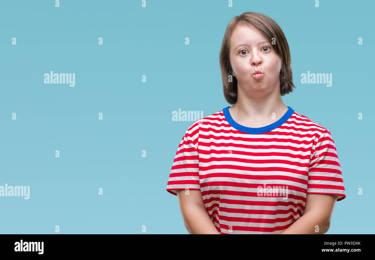 Les jeunes femmes adultes souffrant du syndrome de Down sur fond isolé ...