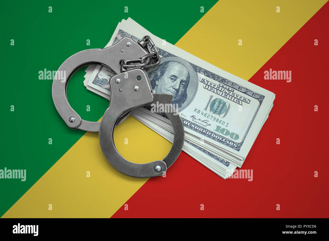 Drapeau Congo avec des menottes et un paquet de dollars. Service de la ...