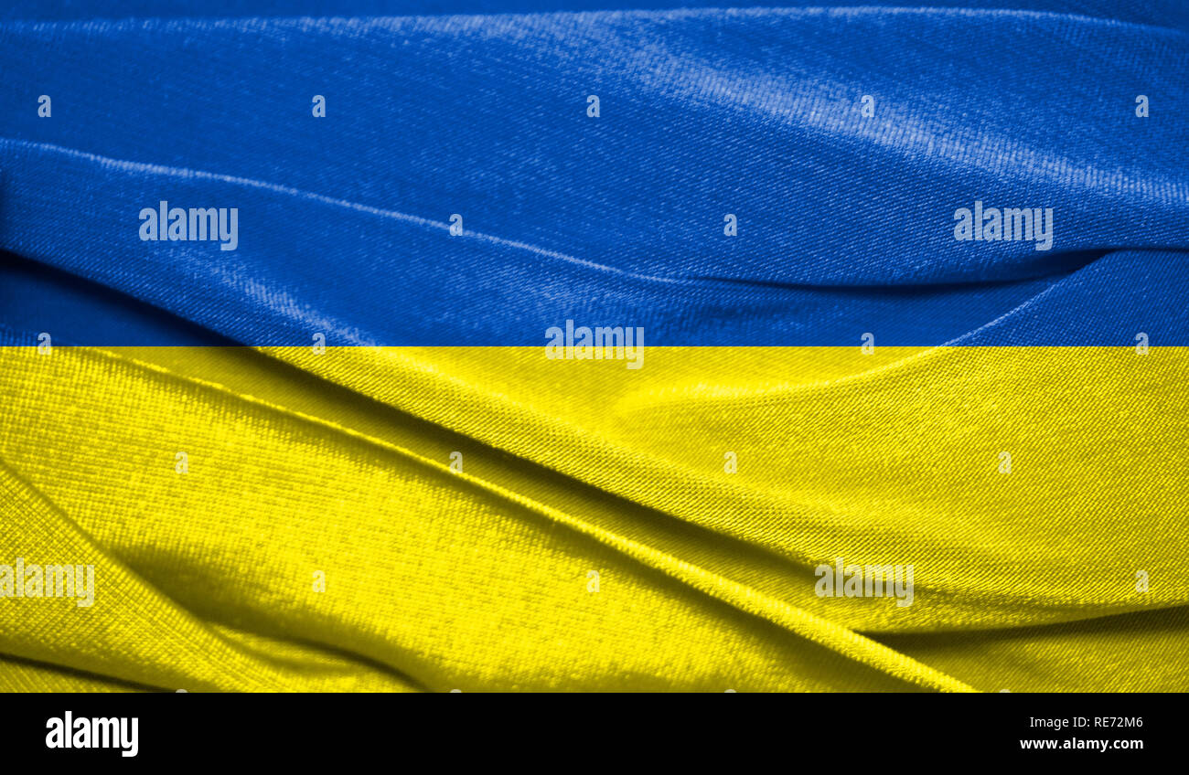 Drapeau réaliste de l'Ukraine sur la surface d'un tissu. Parfait pour ...