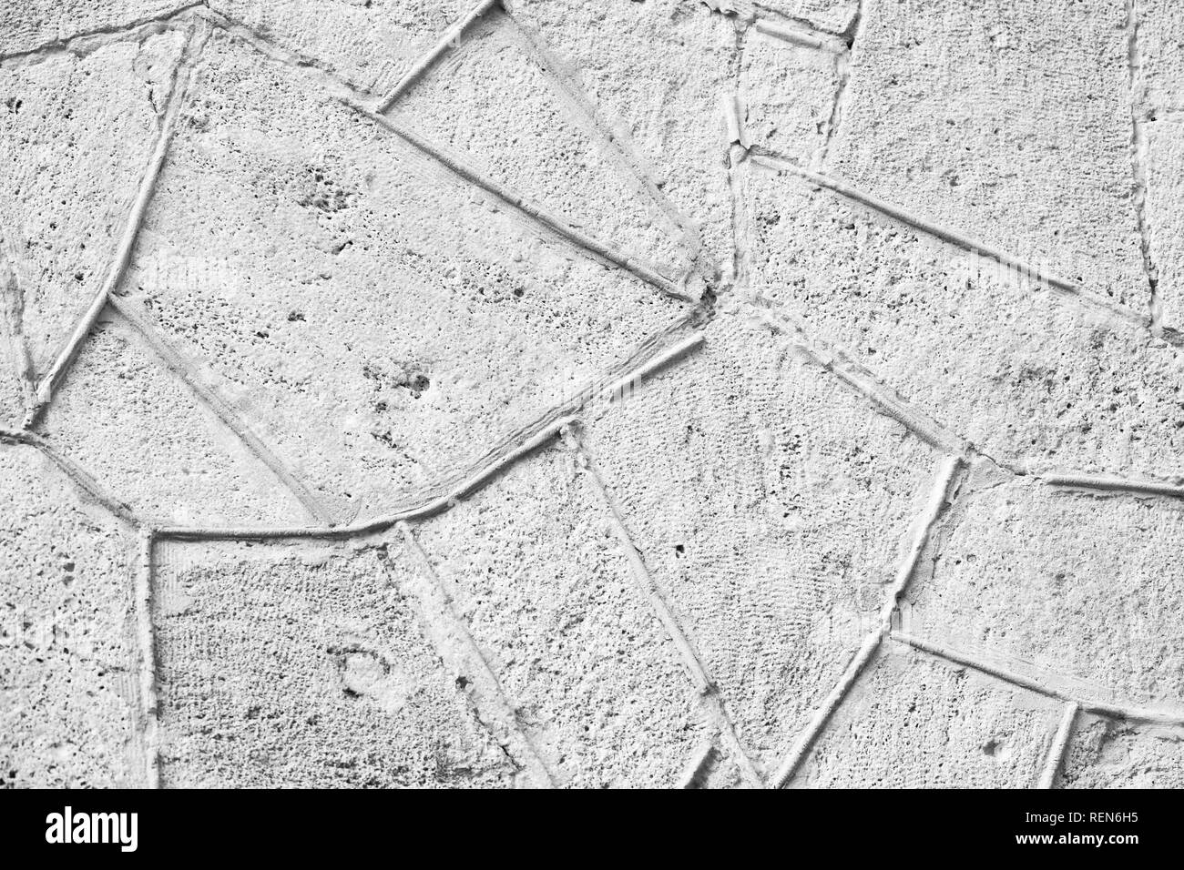 Mur de pierre blanche avec des reliefs en stuc décoratif modèle ...