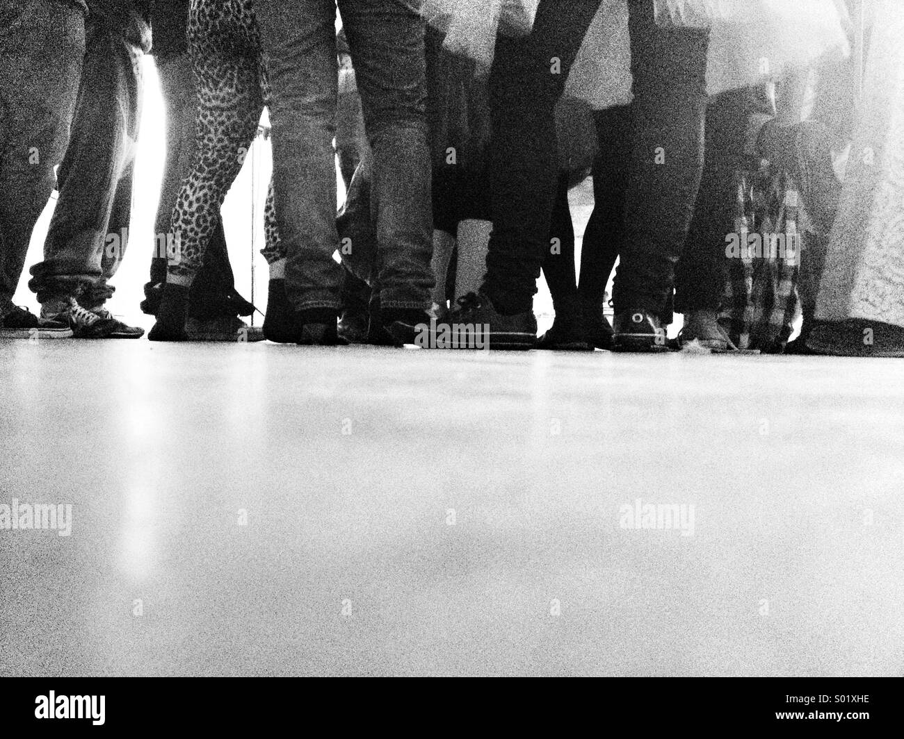 Rassemblement de personnes sur les jambes Photo Stock - Alamy